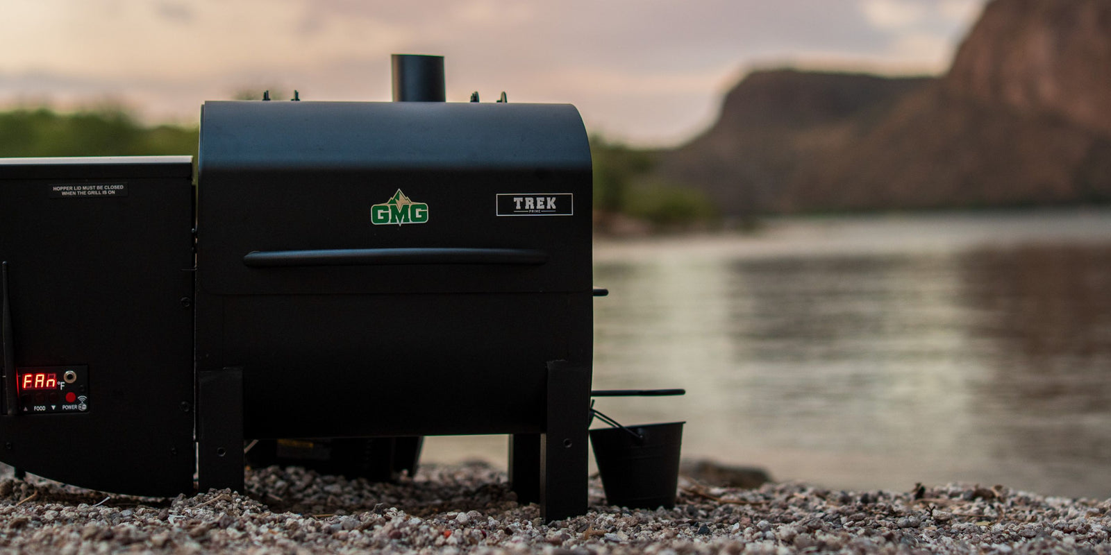 With 12V power, the TREK pellet smoker by Green Mountain Grills lets ...